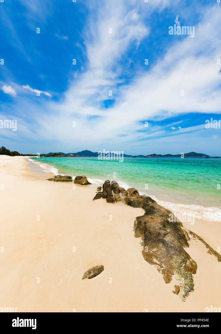 Beautiful white sand beach. Stones on a foreground. Landscape of ...