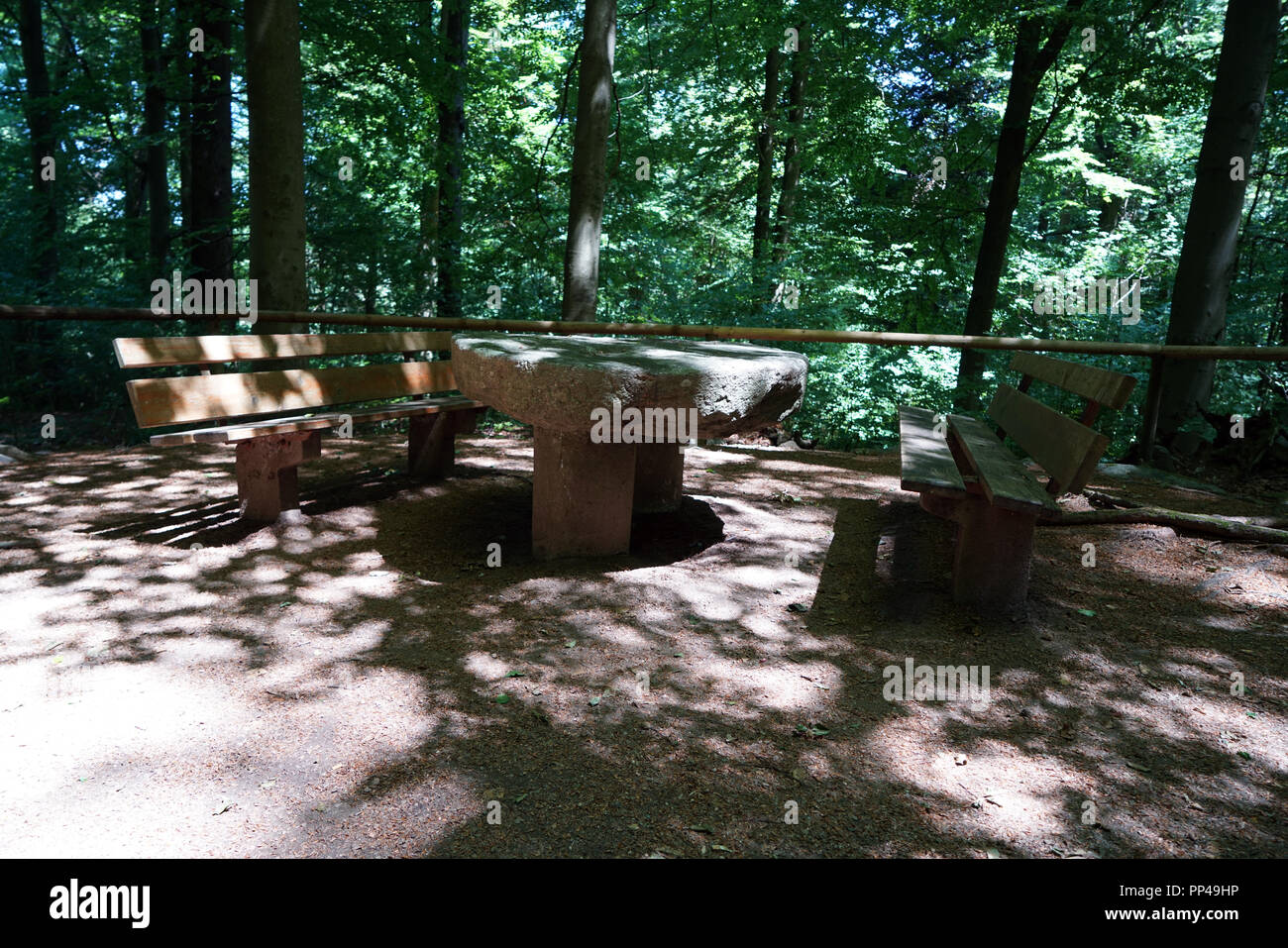 Park bench in a Bavarian park to relax and rest Stock Photo - Alamy