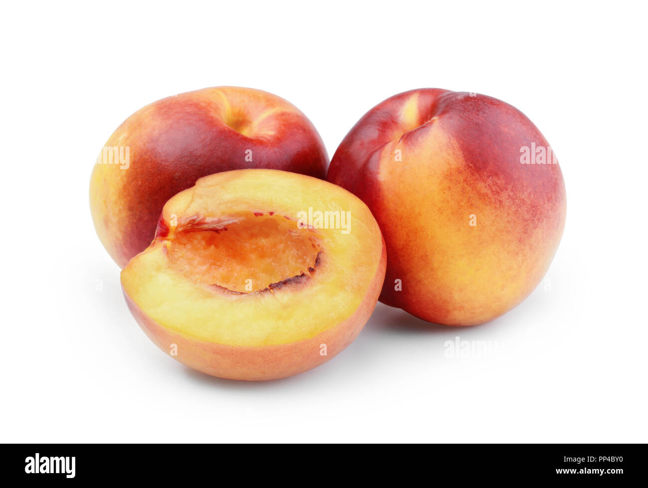Ripe nectarines isolated on white background Stock Photo - Alamy