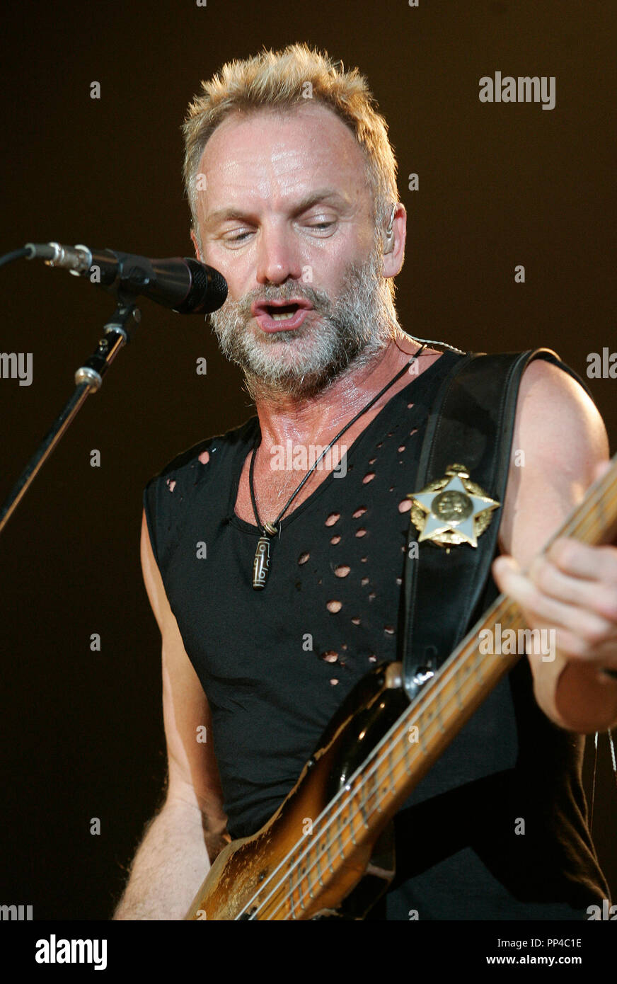 Sting with The Police performs in concert at the Cruzan Amphitheatre in ...