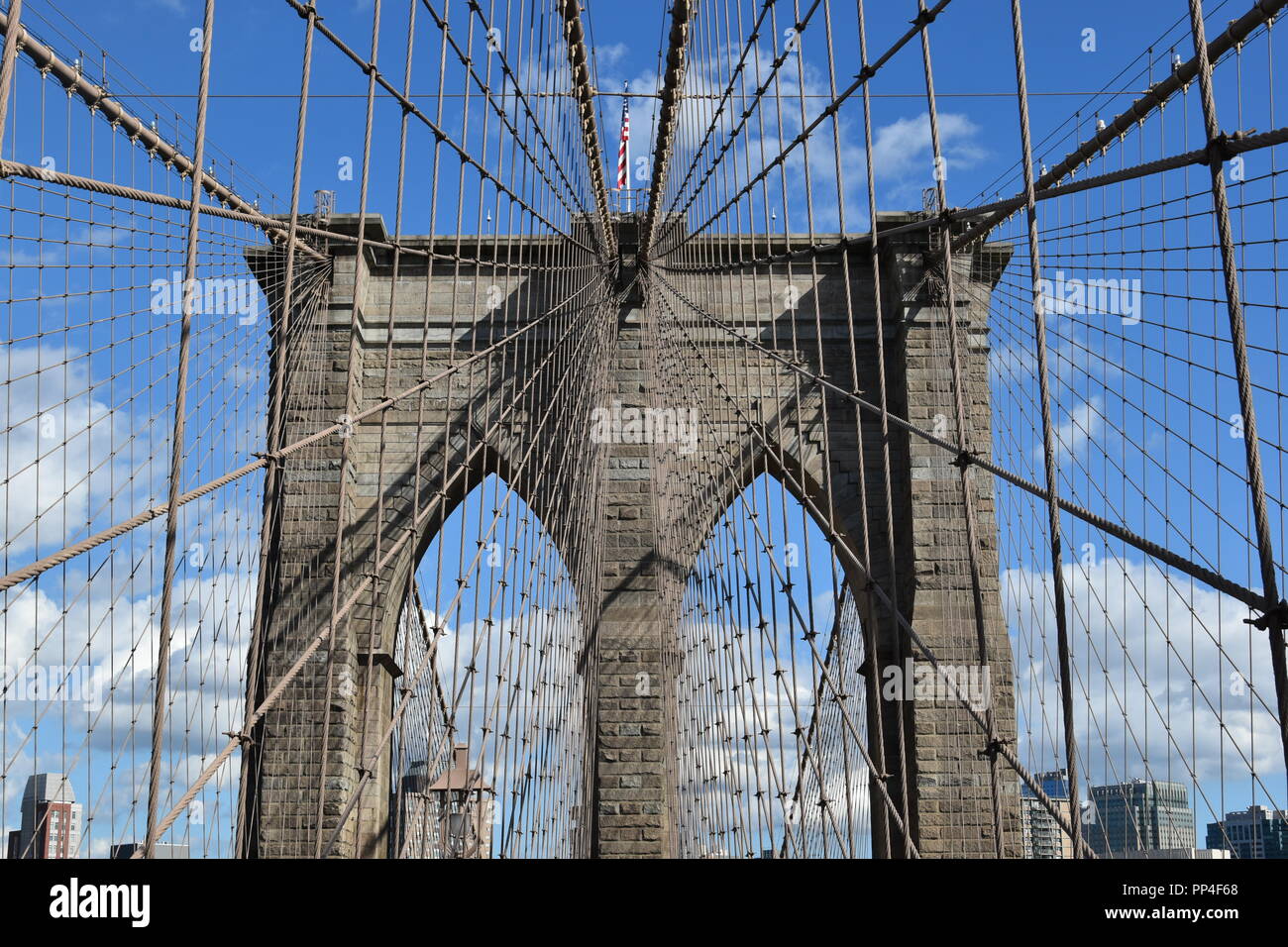The iconic Brooklyn Bridge spanning the East River between Lower ... The iconic Brooklyn Bridge spanning the East River between Lower ...