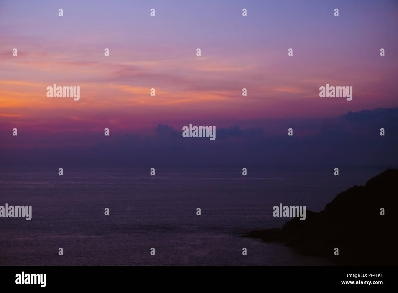 Calm sea in violet sunrise background Stock Photo - Alamy