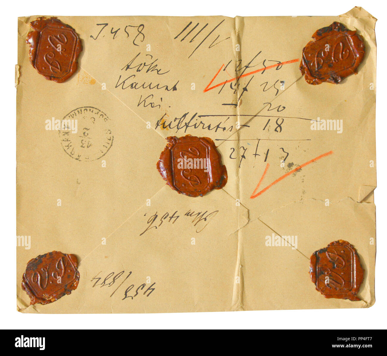 Old vintage yellowed envelope with writing, stamp and red wax seals ...