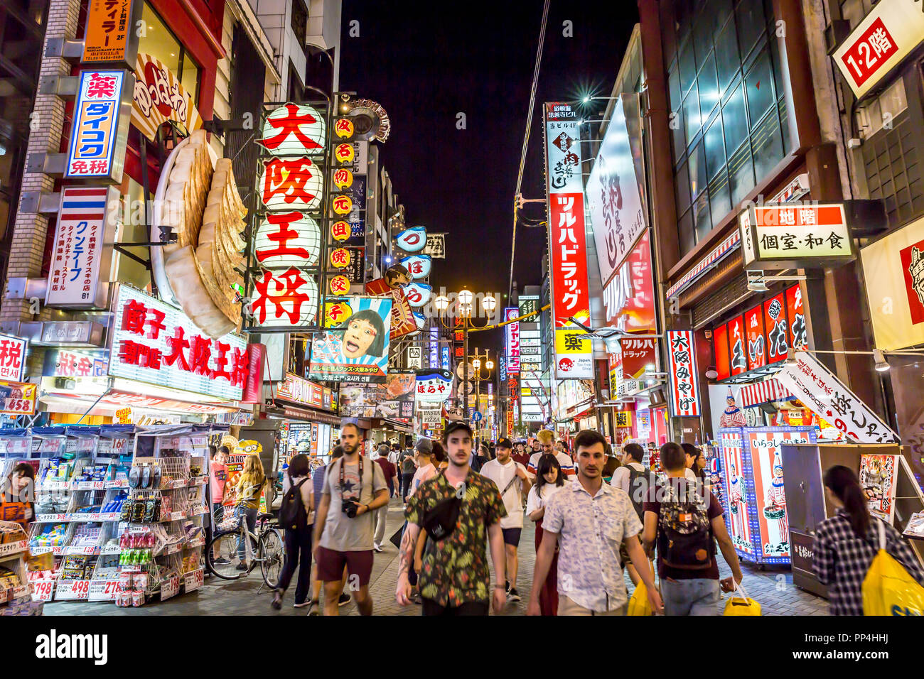 Osaka, Japan - Sep 20th 2018 - Tourists in a busy street in Osaka ...