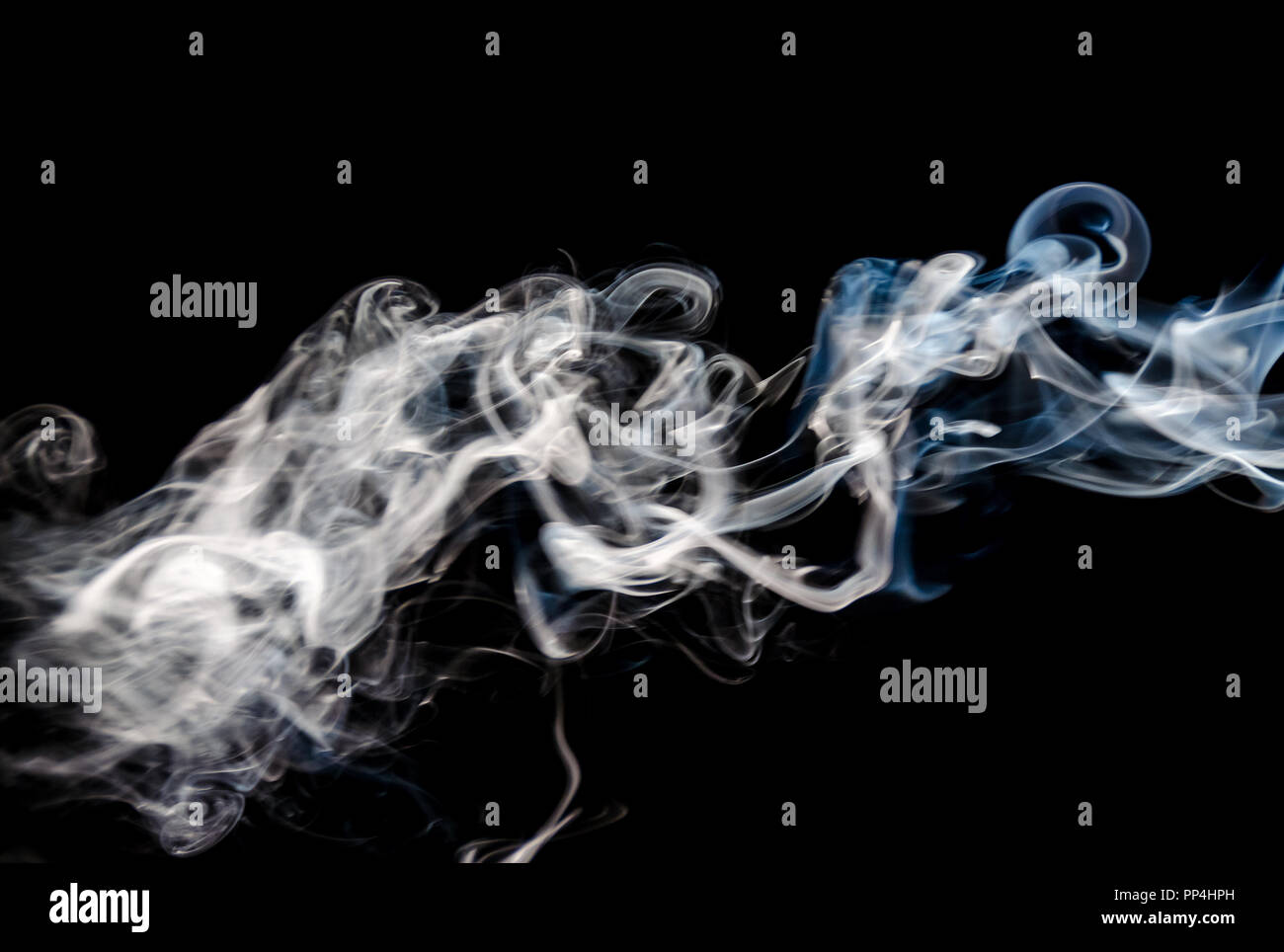 Abstract smoke on a black background Stock Photo - Alamy