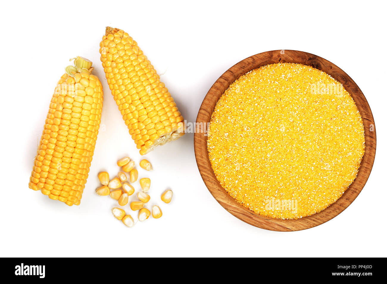 corn groats or cornmeal in wooden bowl and corncob isolated on white ...