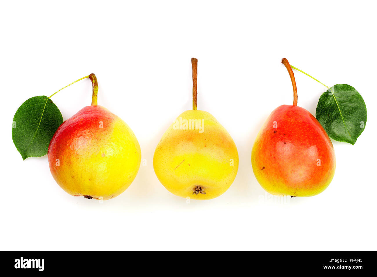 Three ripe red yellow pear fruits with leaf isolated on white ...