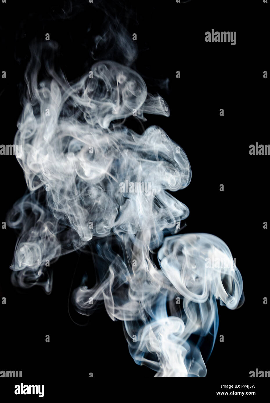 Abstract smoke on a black background Stock Photo - Alamy