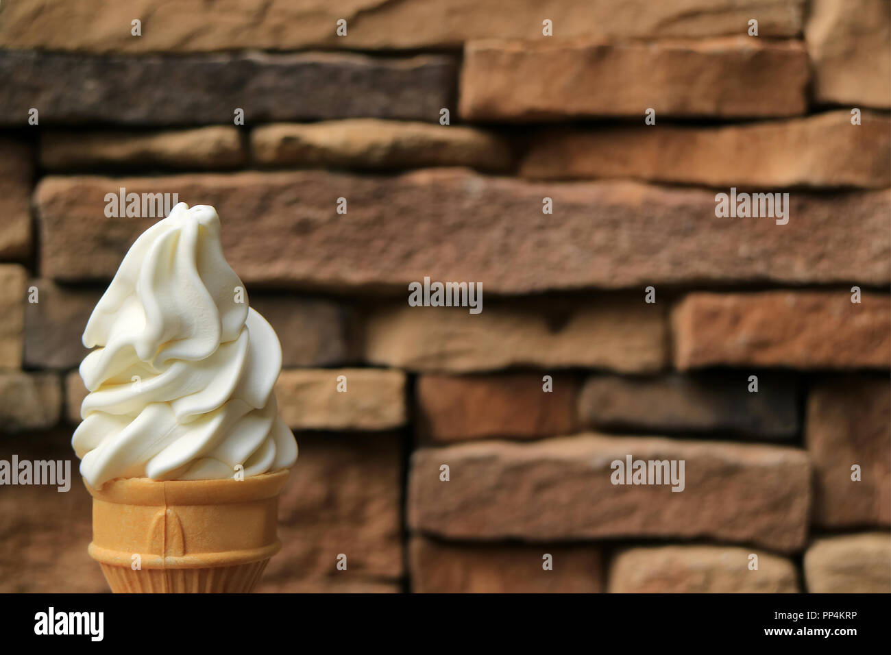 Front View of Milky White Vanilla Soft Serve Ice Cream Cone with ...
