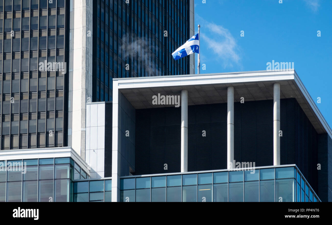 The Quebec flag displayed in downtown Montreal, French Canada Stock ...