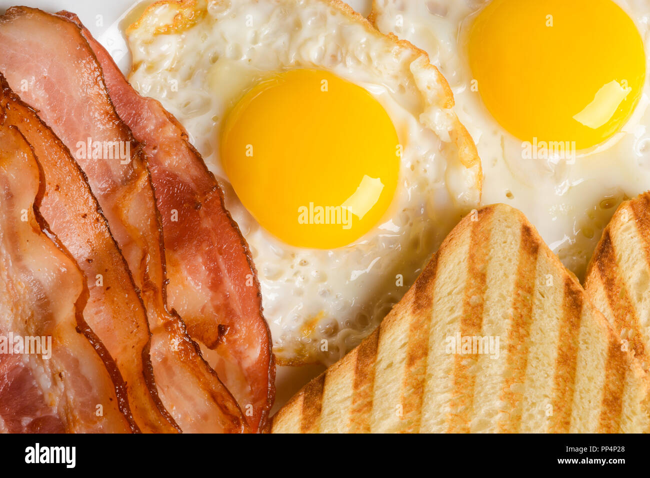 Toasts and bacon strips Stock Photo - Alamy