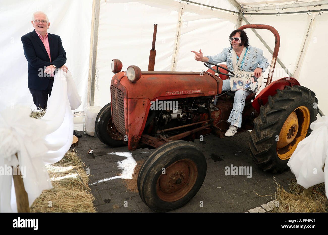 Myles Kavanagh 'The Kilkenny Elvis' (right) arrives for the unveiling ...