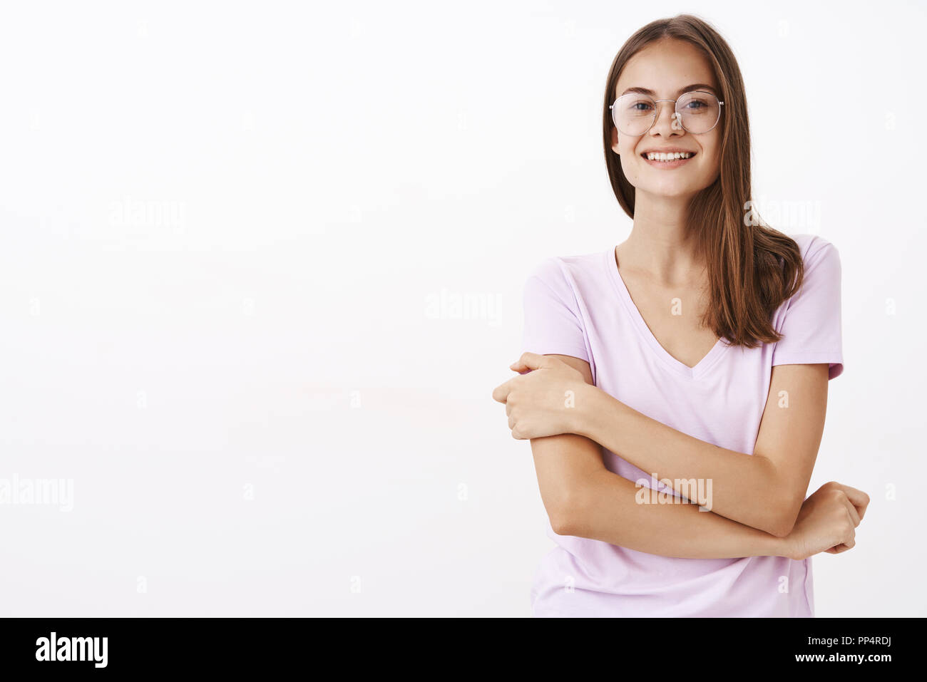 Creative and smart good-looking female student in roung glasses and ...