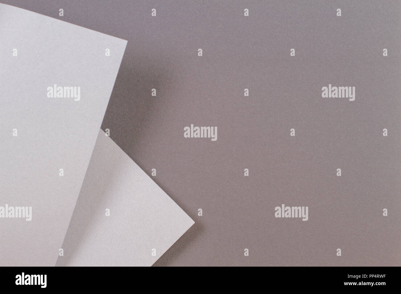Abstract geometric shape gray color paper background Stock Photo - Alamy