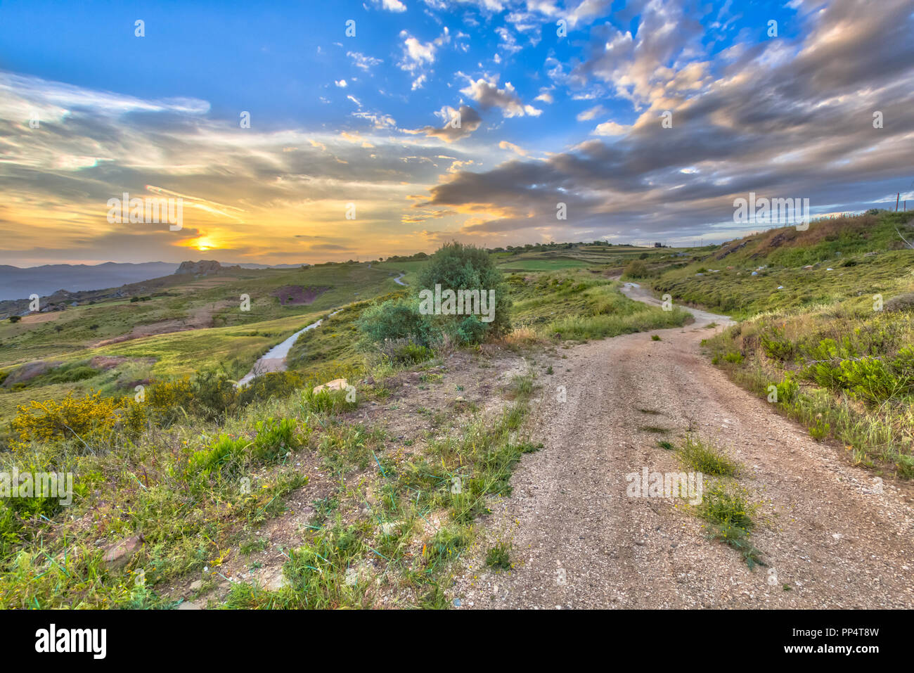 Rural Road through Mediterranean landscape on the island of Cyprus with ...