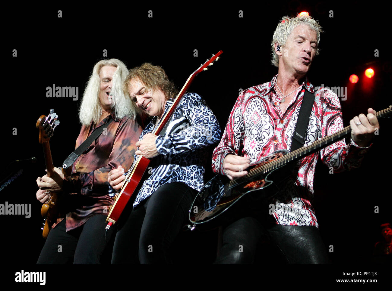 Kevin Cronin (R), Dave Amato (C) and Bruce Hal with REO Speedwagon ...