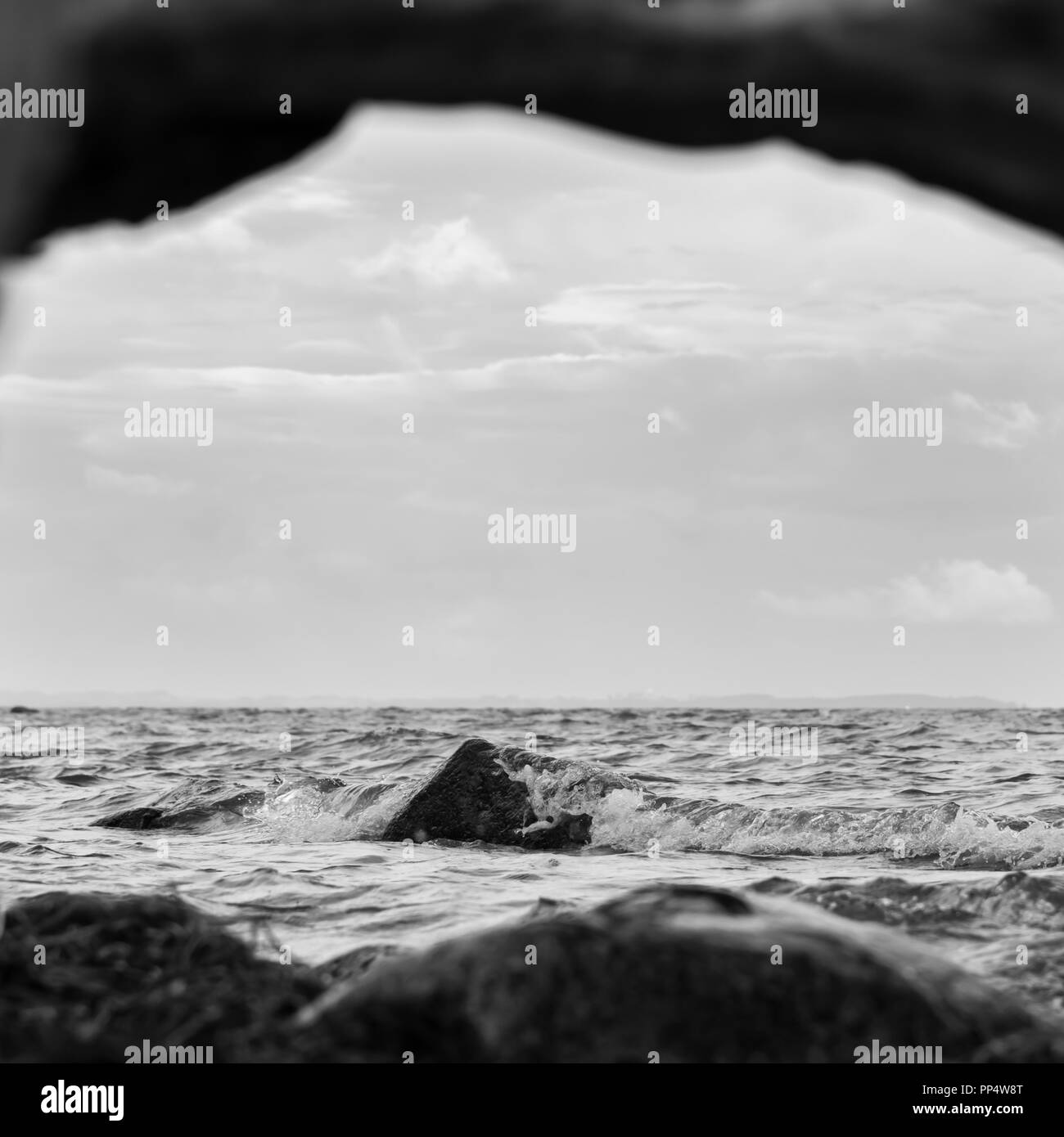 The lonely stone, which despite the water Stock Photo - Alamy