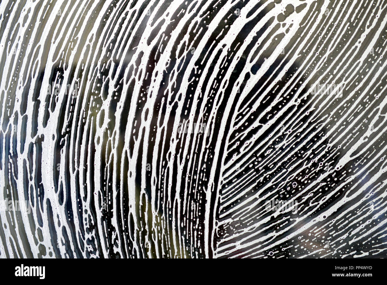 car wash foam patterns on a car window,image of a Stock Photo - Alamy
