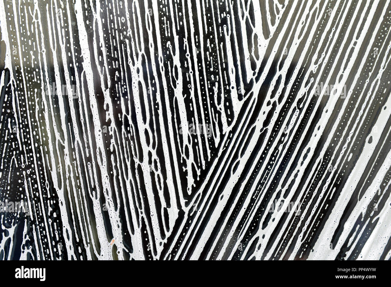 car wash foam patterns on a car window,image of a Stock Photo - Alamy