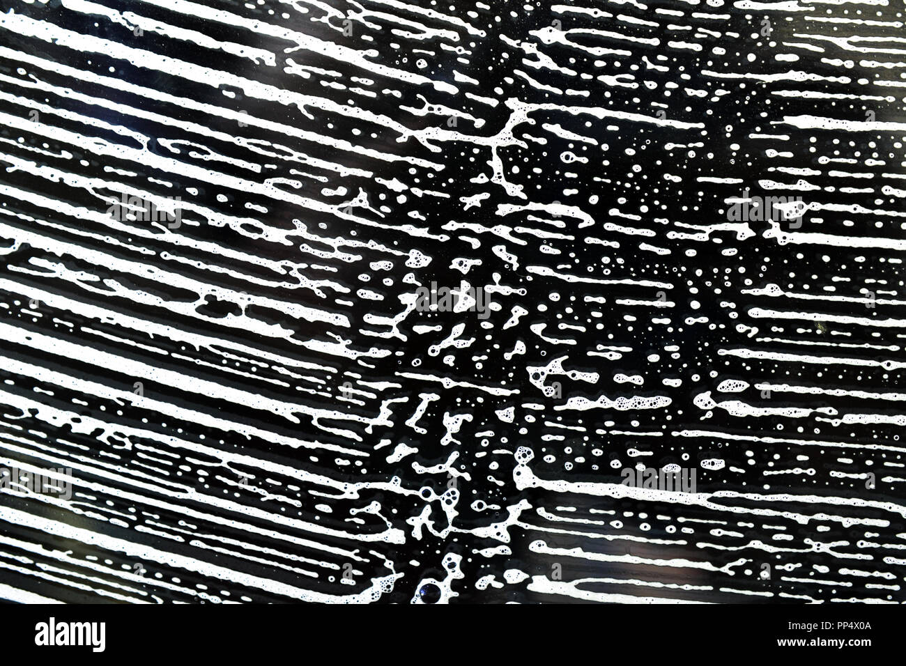 car wash foam patterns on a car window,image of a Stock Photo - Alamy