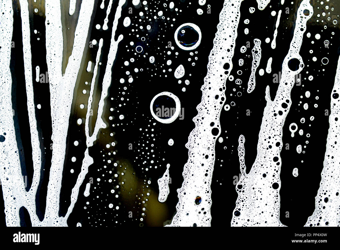 car wash foam patterns on a car window,image of a Stock Photo - Alamy