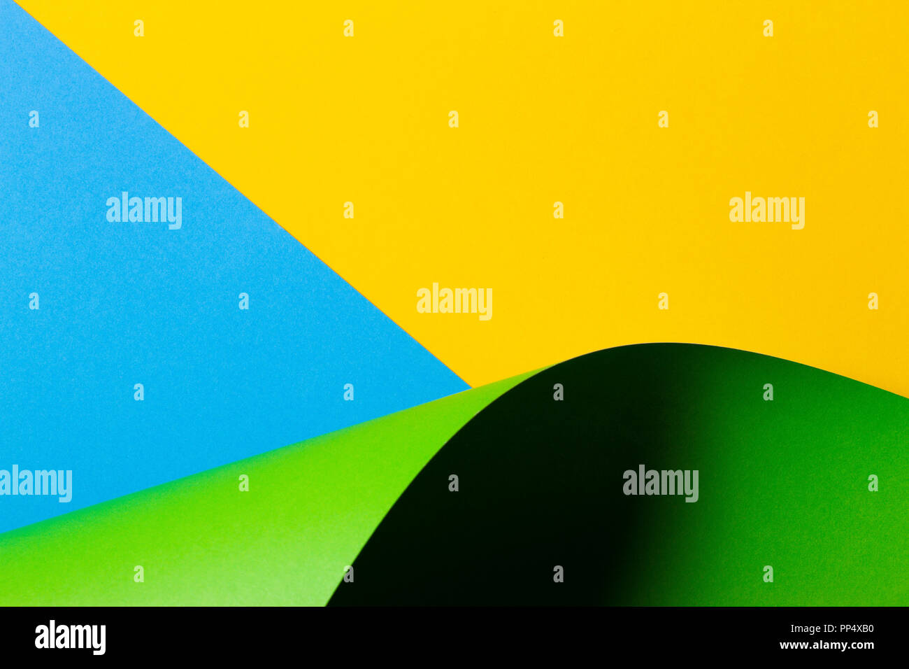 Abstract colorful background. Yellow red blue color paper in geometric ...