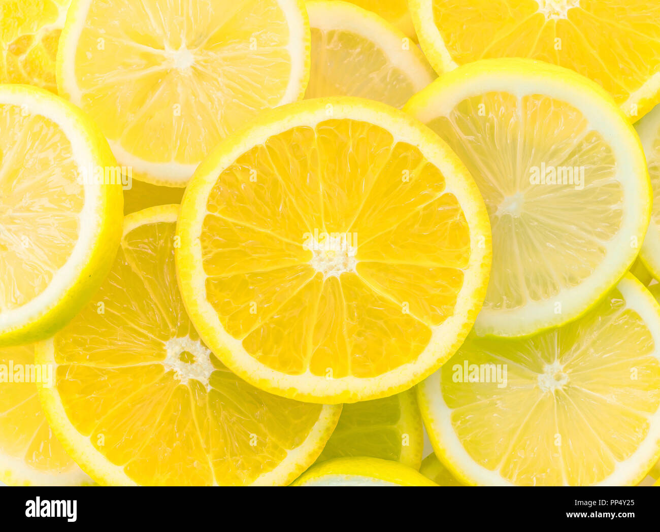 Green cut lemon Fruit background Stock Photo - Alamy
