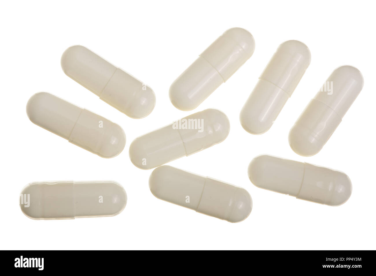 white pill capsule isolated on white background. Top view. Flat lay ...