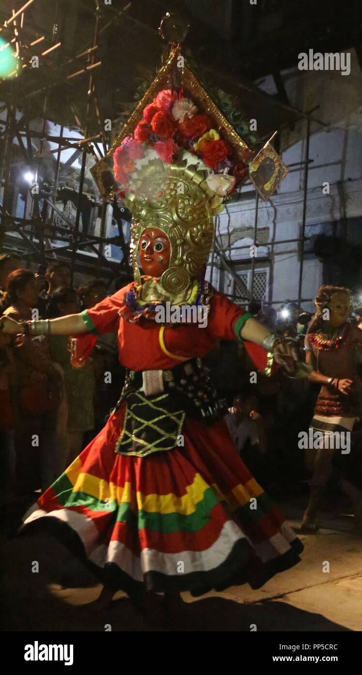 Kathmandu, Nepal. 22nd Sep, 2018. A masked dancer performs in ...