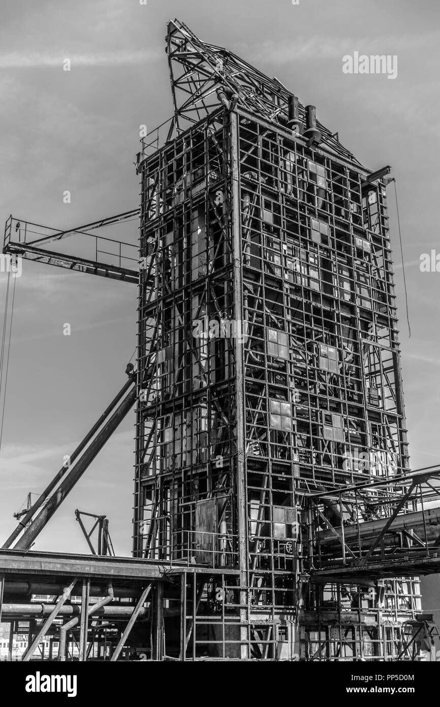 impressive black and white image of the metal structure of an abandoned ...