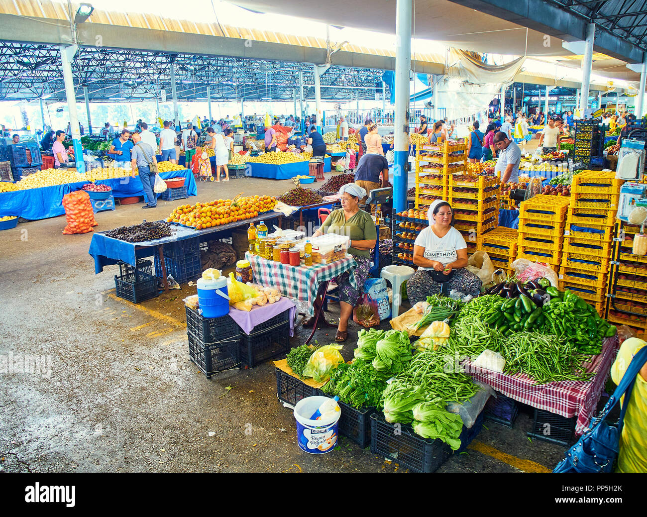 Bodrum, Turkey - July 6, 2018. Citizens shopping in Bodrum market ...
