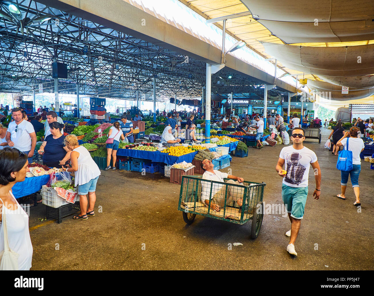 Bodrum, Turkey - July 6, 2018. Citizens shopping in Bodrum market ...