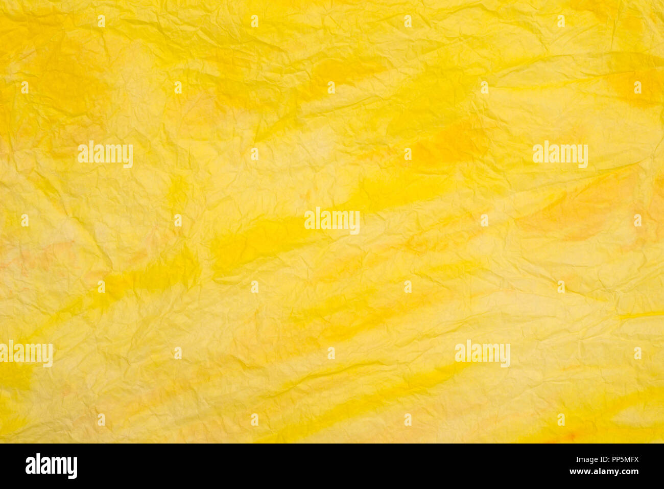 yellow creased colored tissue paper background texture macro Stock ...