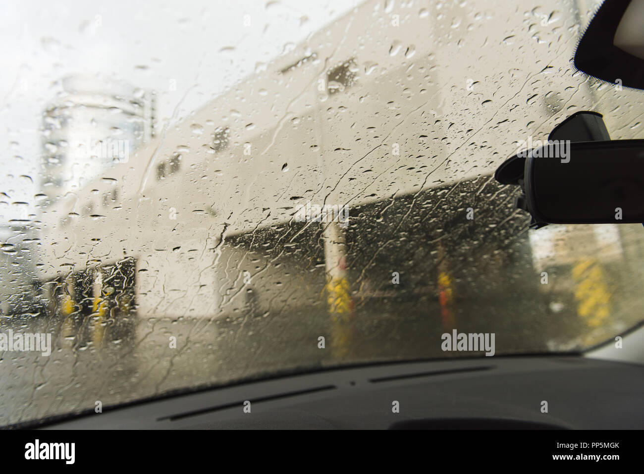 Water rain streams and drops at car window Stock Photo - Alamy
