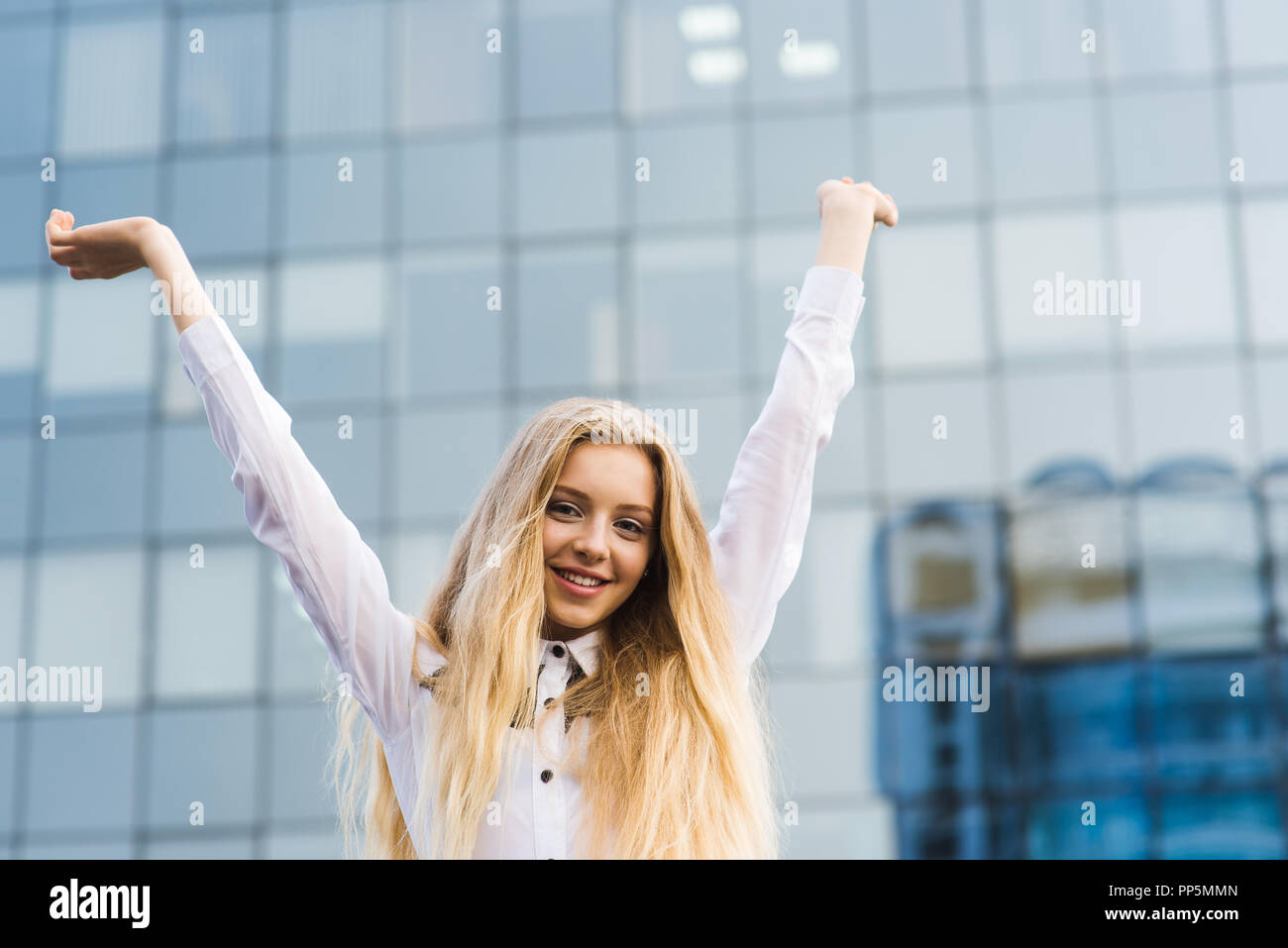 Girl raise hi-res stock photography and images - Alamy
