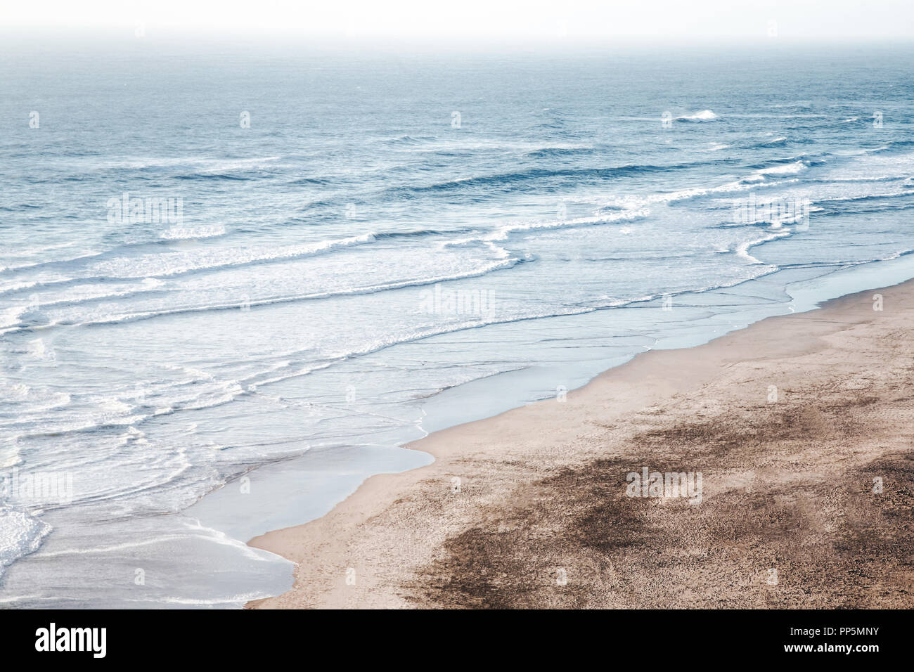 Beautiful sand beach and tropical turquoise blue sea Stock Photo - Alamy