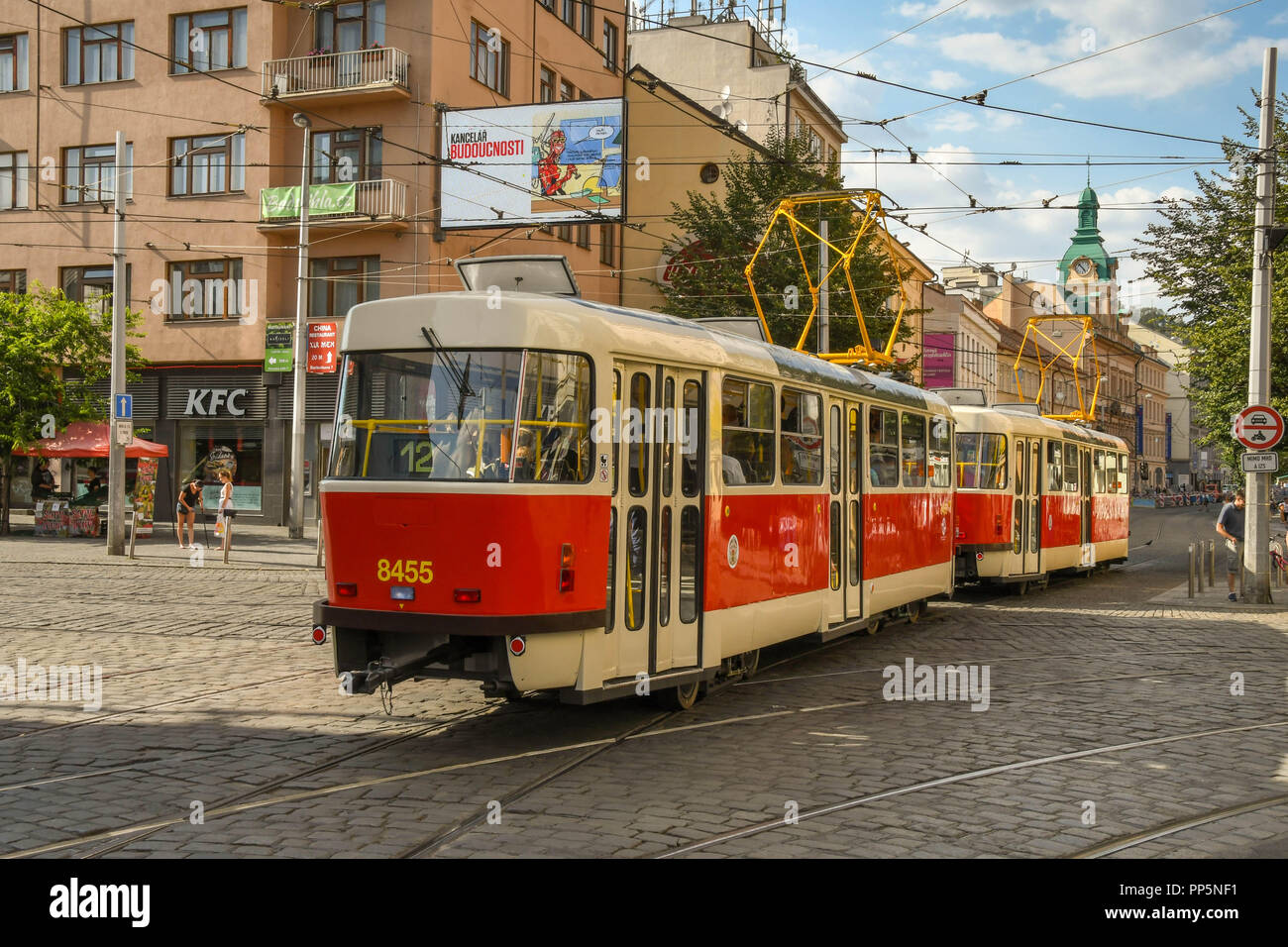 Electric tram running along a street in the centre of Prague Stock ...