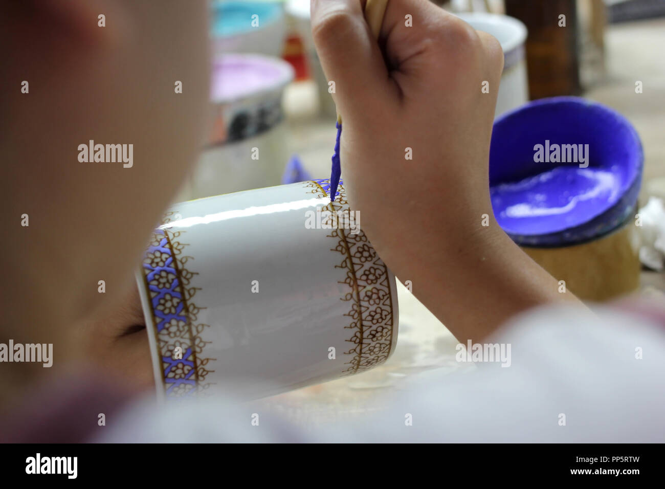 artist painting benjarong ceramic ware , A traditional Thai five ...