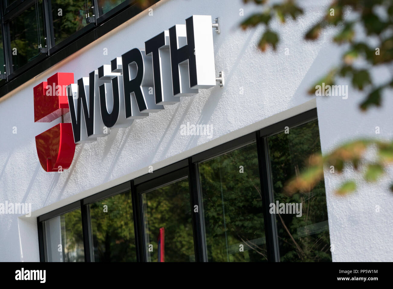 A logo sign outside of a facility occupied by the The Wurth Group in ...