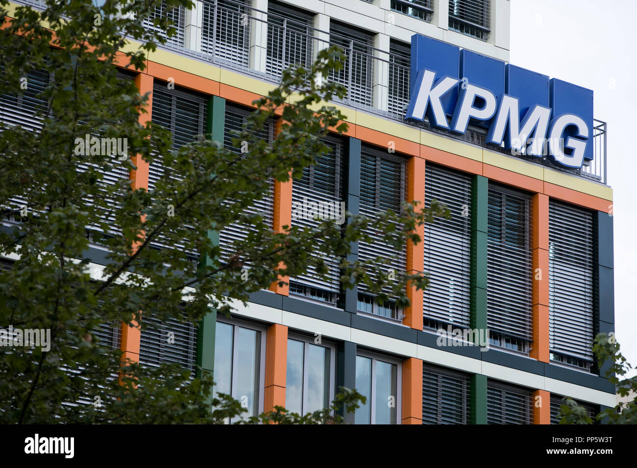 A logo sign outside of a facility occupied by KPMG in Munich, Germany ...