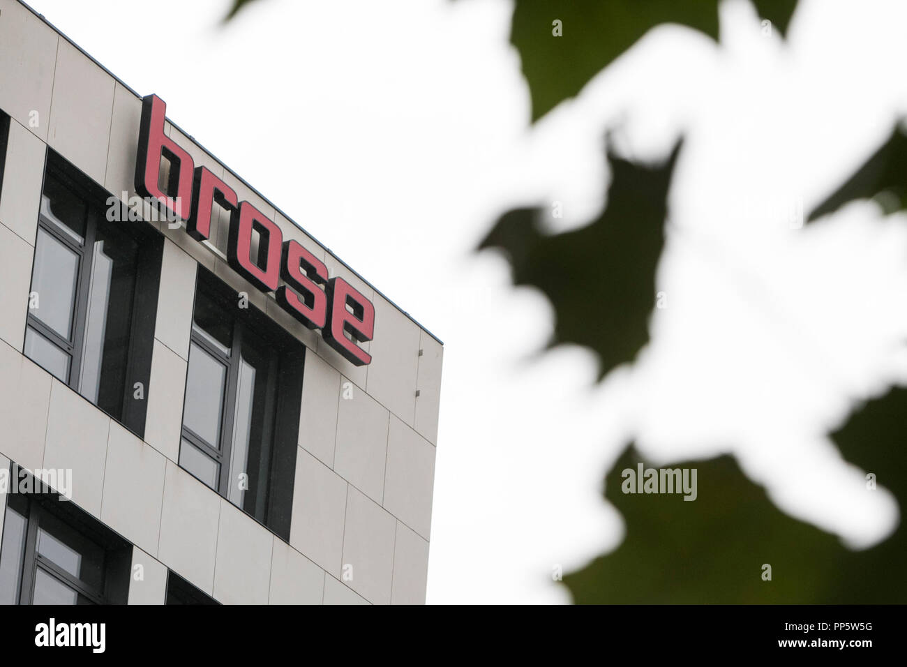 A logo sign outside of a facility occupied by Brose Fahrzeugteile GmbH ...