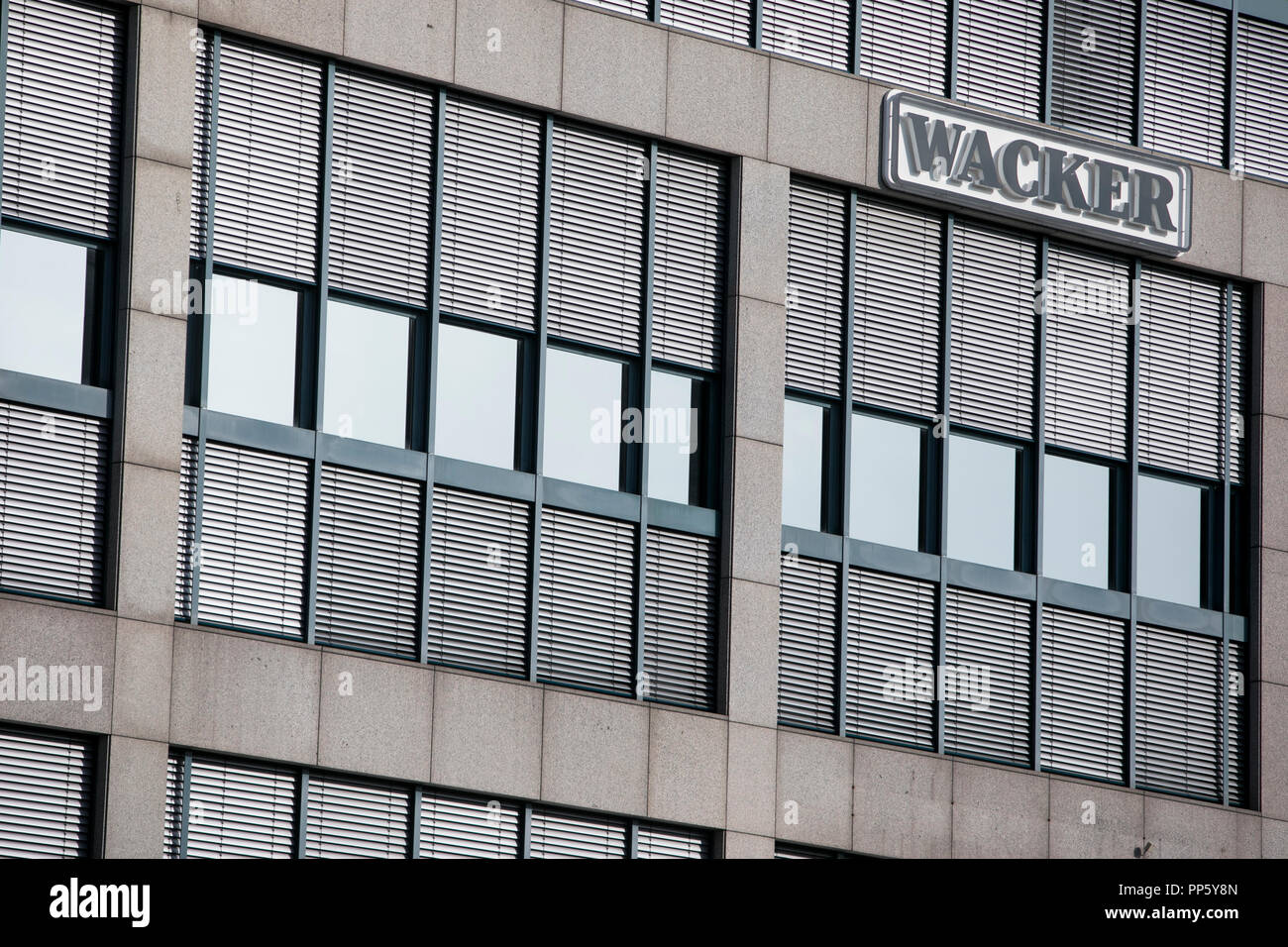 A logo sign outside of the headquarters of Wacker Chemie in Munich ...