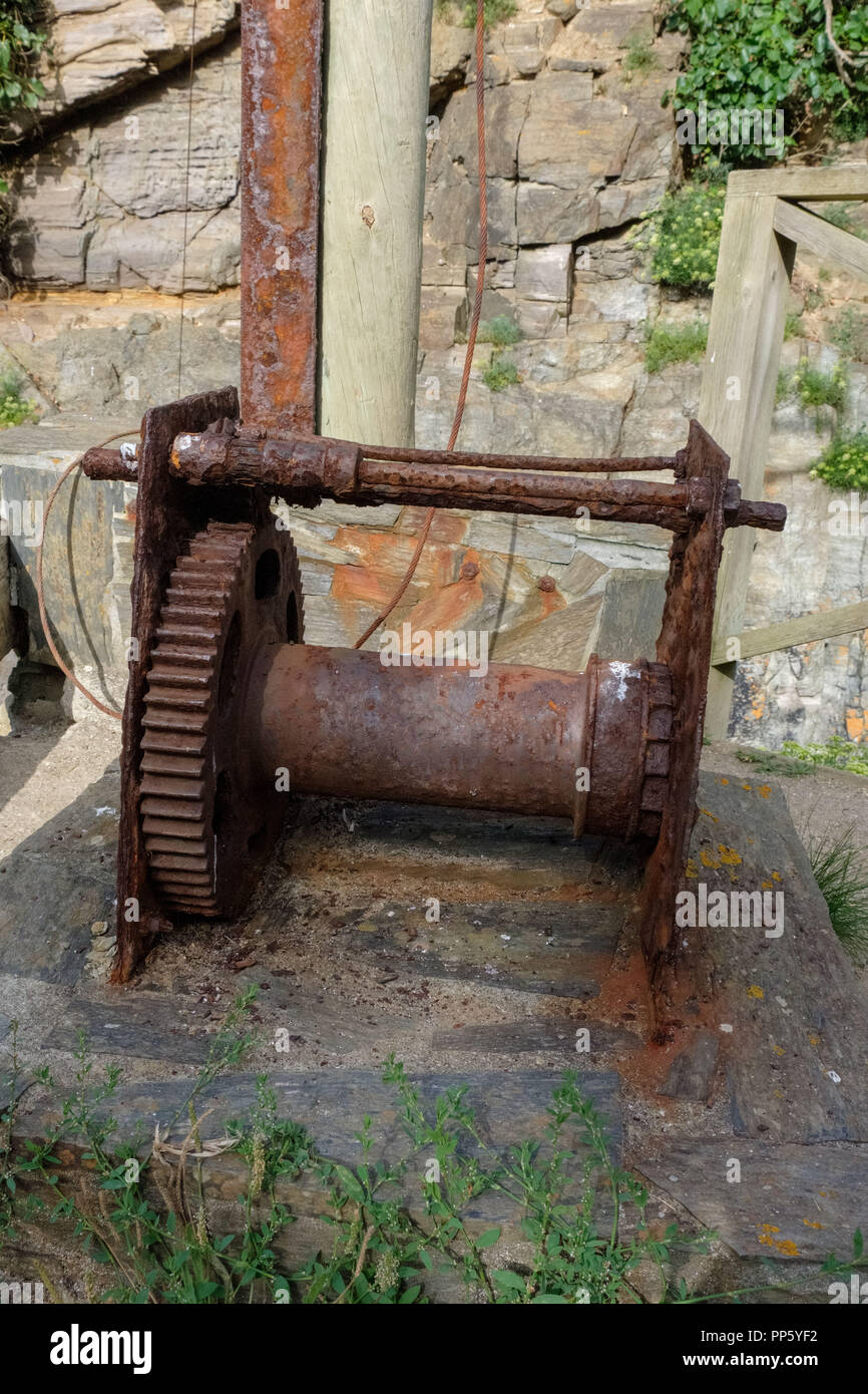 Machinery of an old manual crane already rusted and in disuse, used to ...