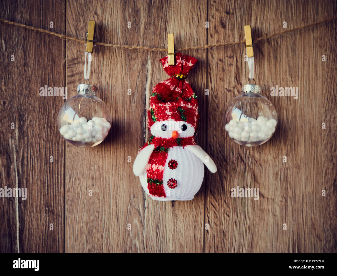 Christmas decorations: reindeer, Snowman and snowballs on the wooden ...