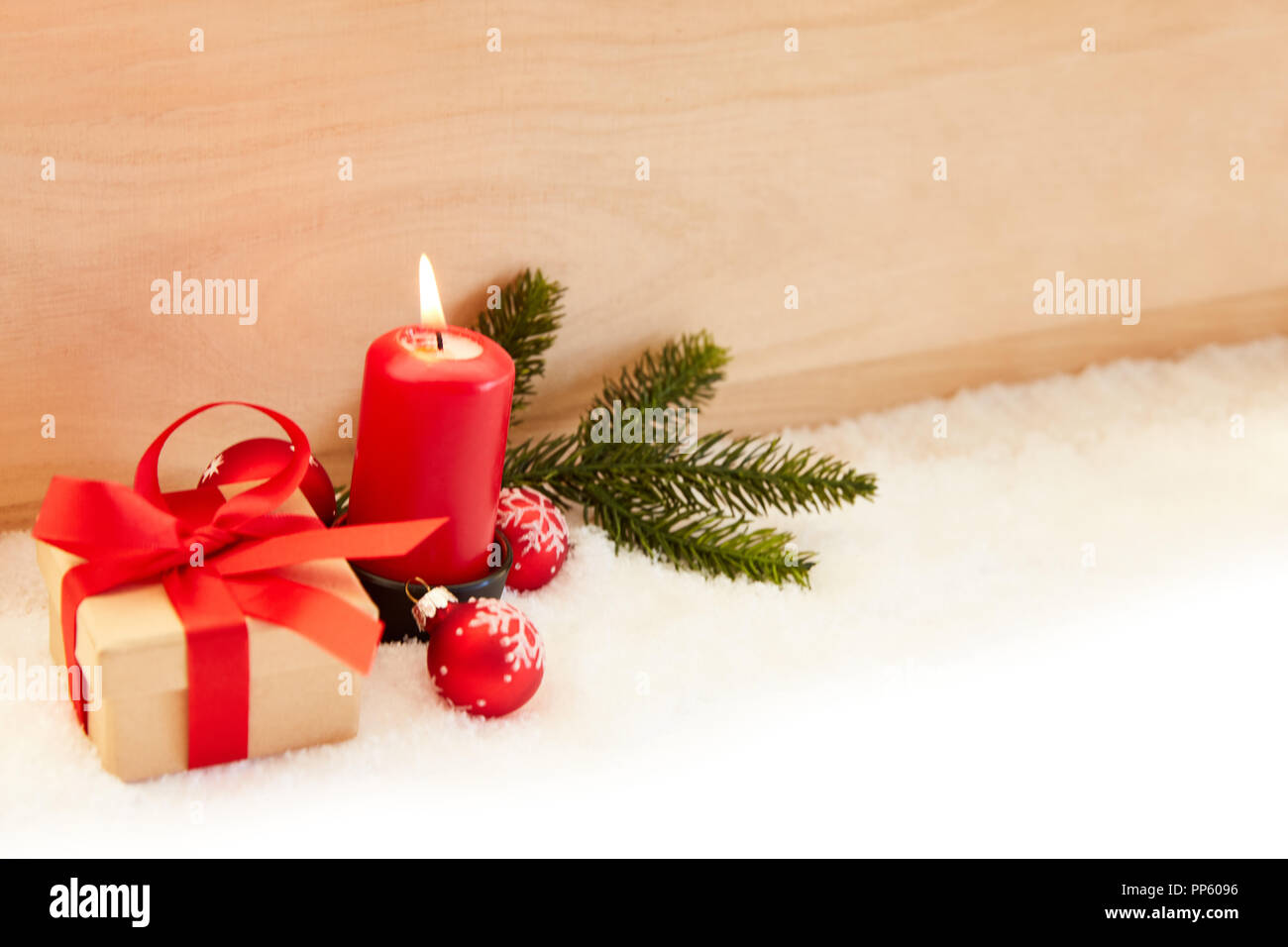 Red burning candle for the first advent before Christmas with ...