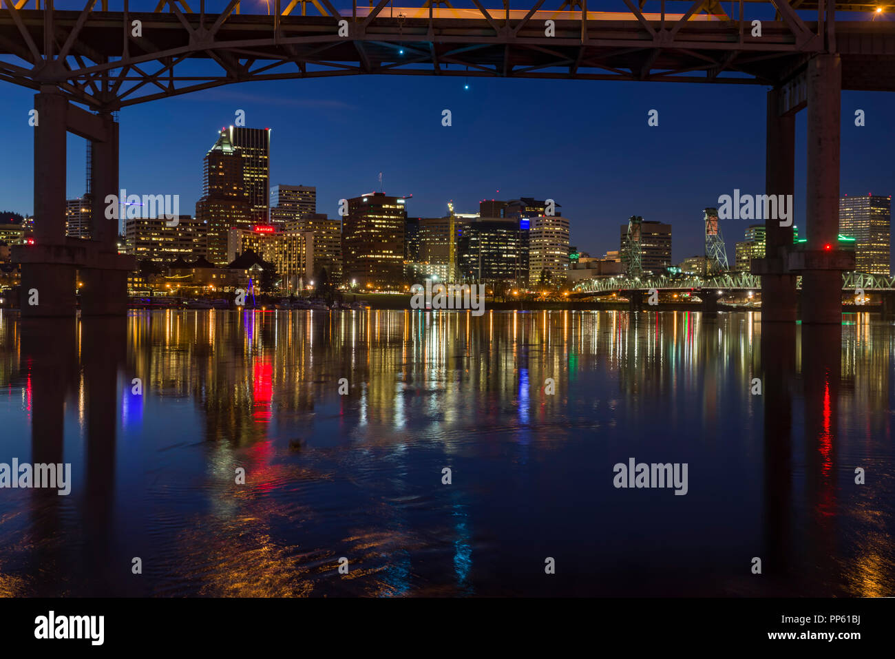 Night cityscape of Portland Oregon showing the Marquam Bridge and ...