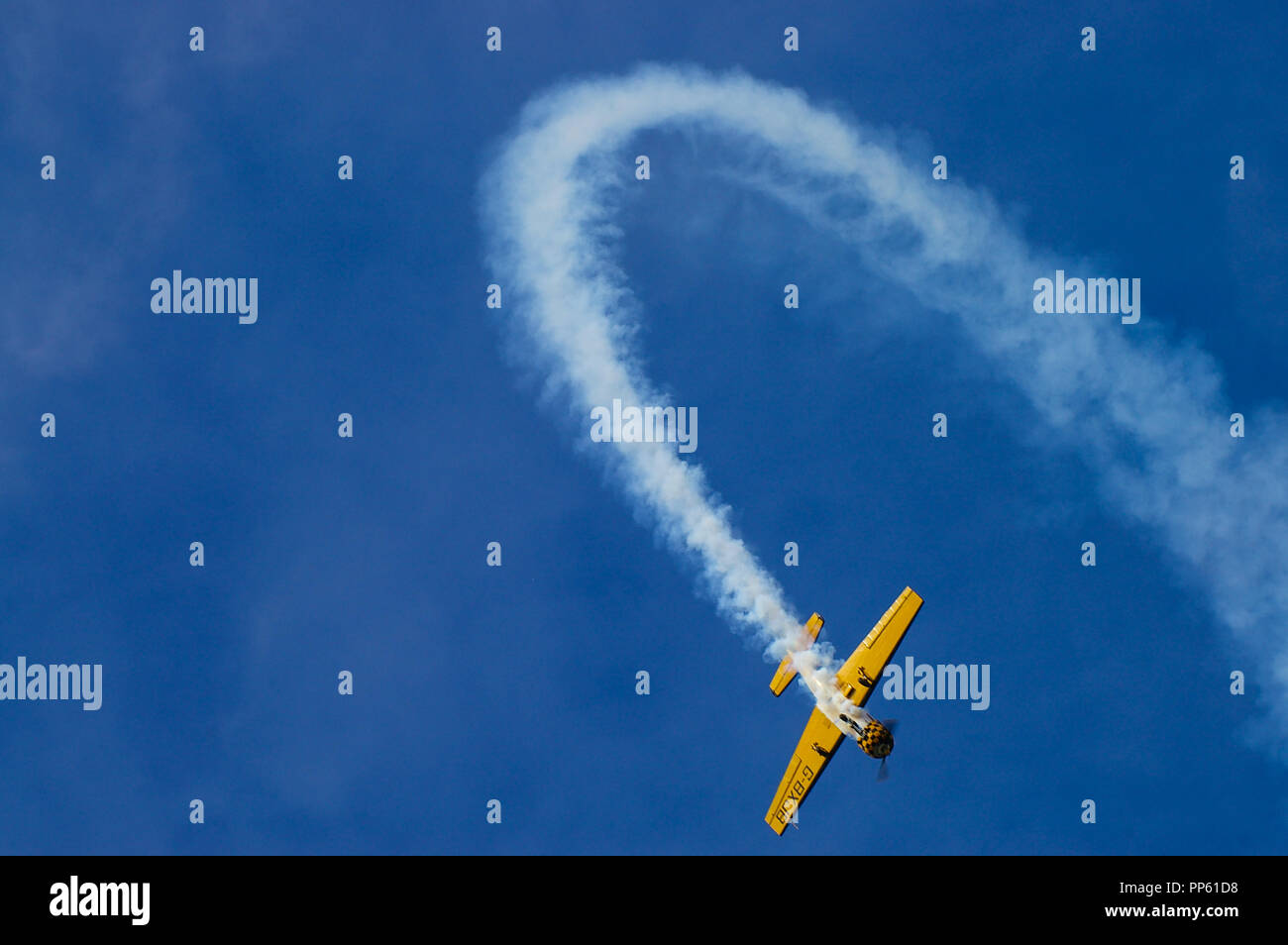 Smoke Trail In The Sky Blue High Resolution Stock Photography and ...
