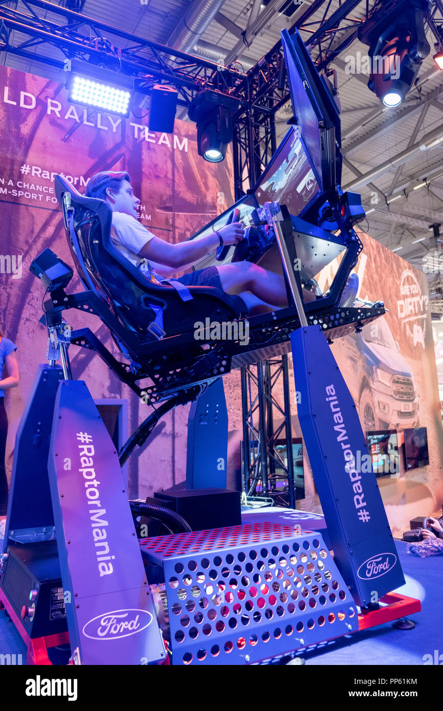 Visitor in the 4D driving simulator of Ford #RaptorMania at the world's ...