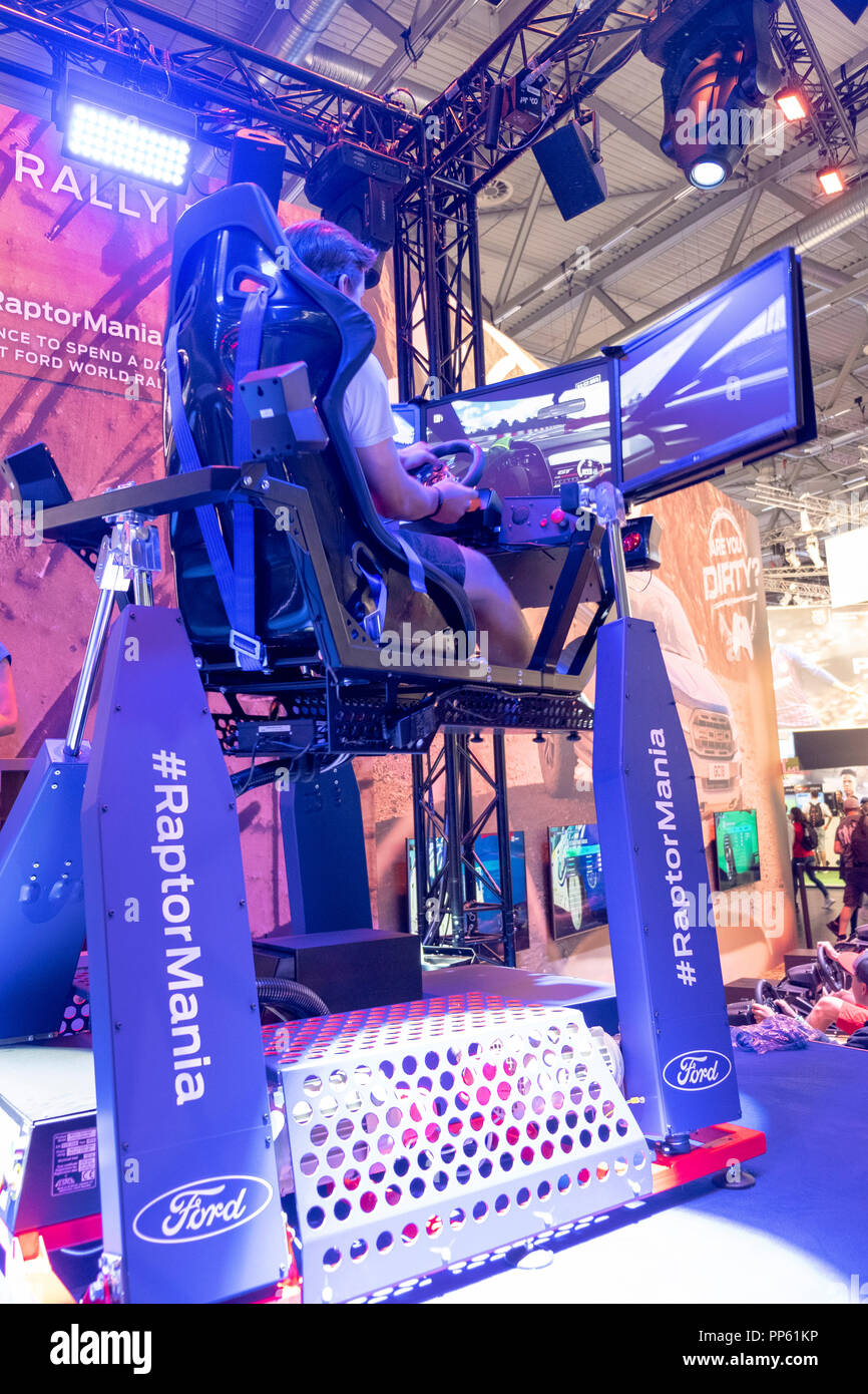 Visitor in the 4D driving simulator of Ford #RaptorMania at the world's ...