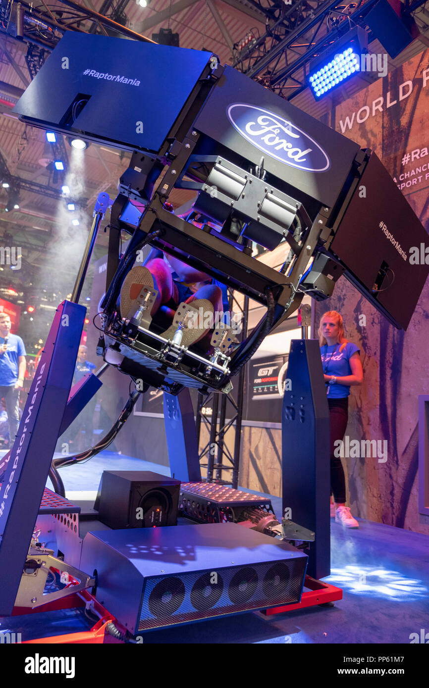 Visitor in the 4D driving simulator of Ford #RaptorMania at the world's ...